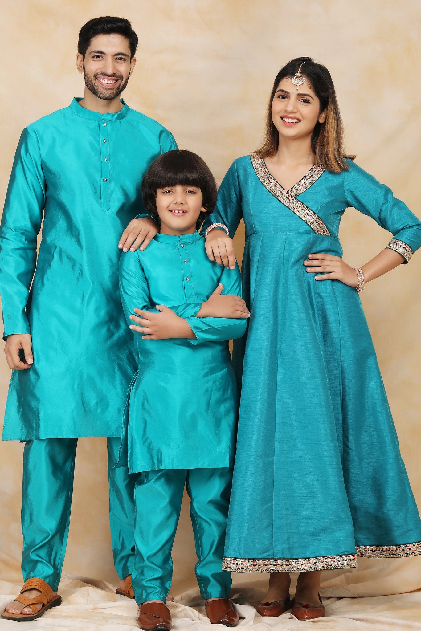 Exquisite Peacock Blue Ethnic Silk Gown with Matching Kurta Pyjama Fam