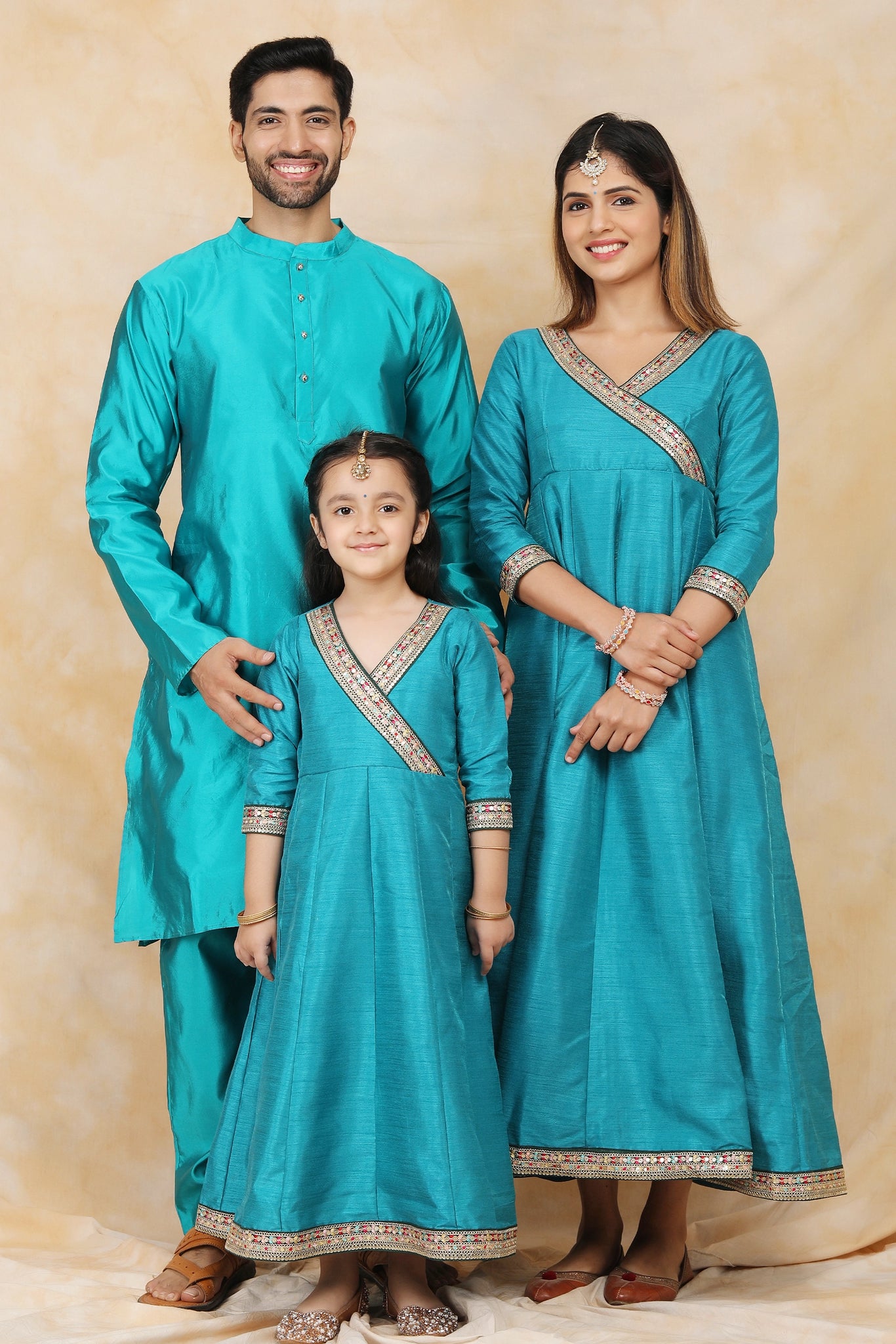 Exquisite Peacock Blue Ethnic Silk Gown with Matching Kurta Pyjama Fam